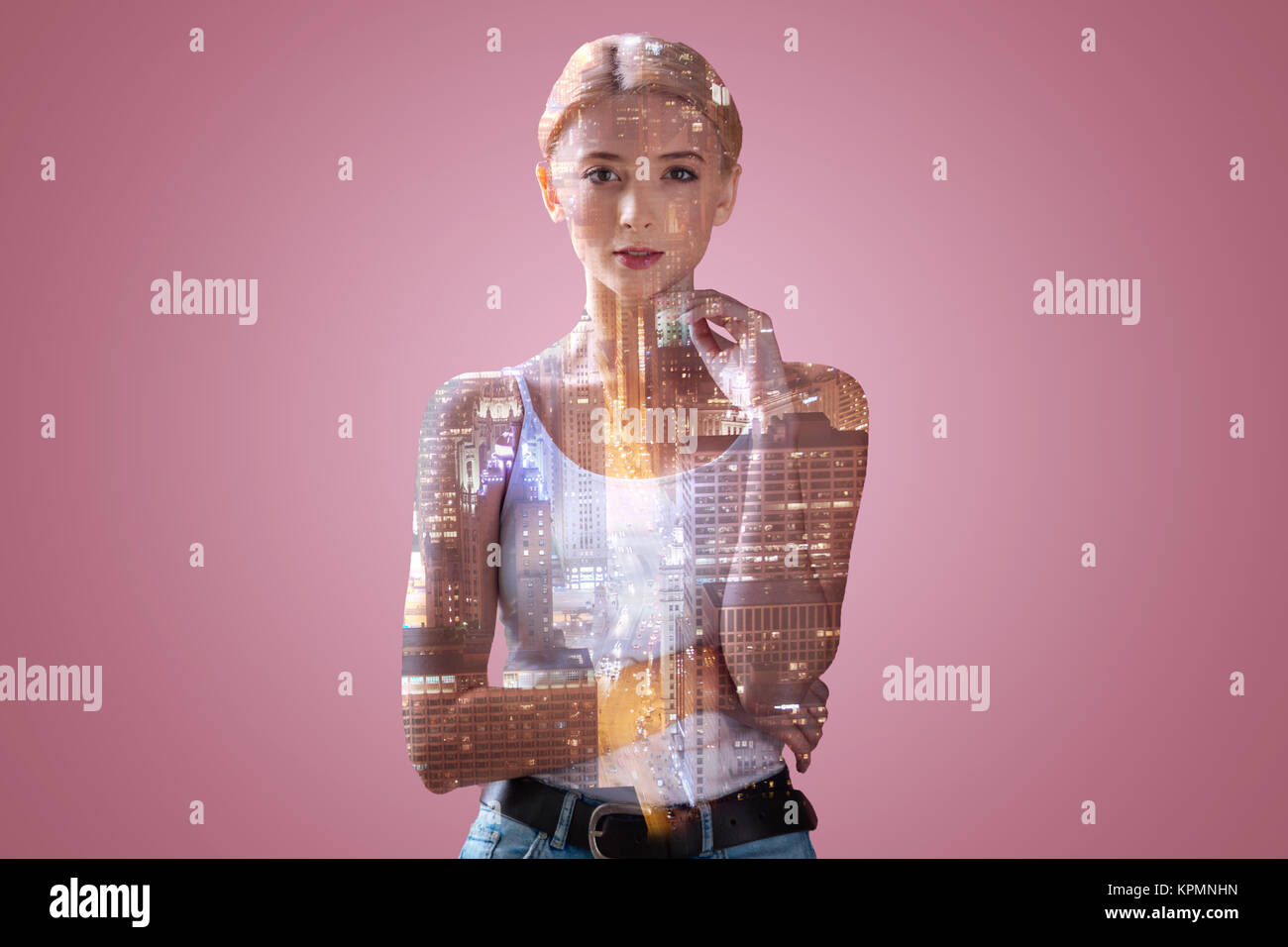 Beautiful millennial lady posing against urban background Stock Photo ...