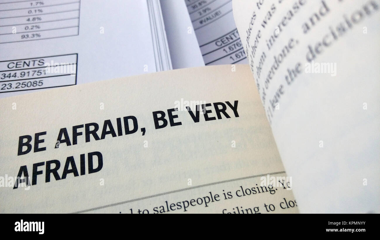 Be afraid word on the book Stock Photo - Alamy