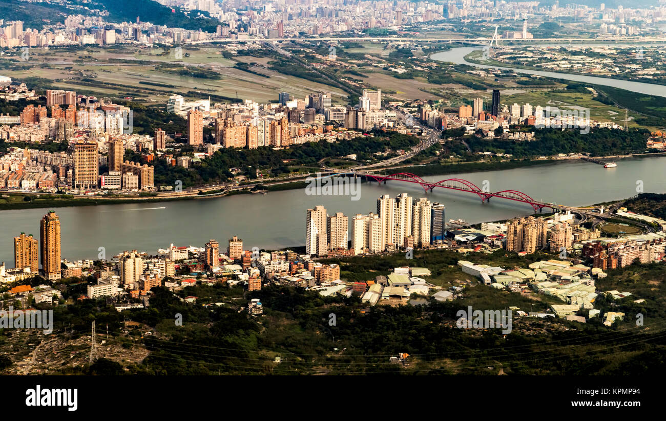 Scenery of Tamsui river with famous Guandu Bridge far away in Tamsui ...