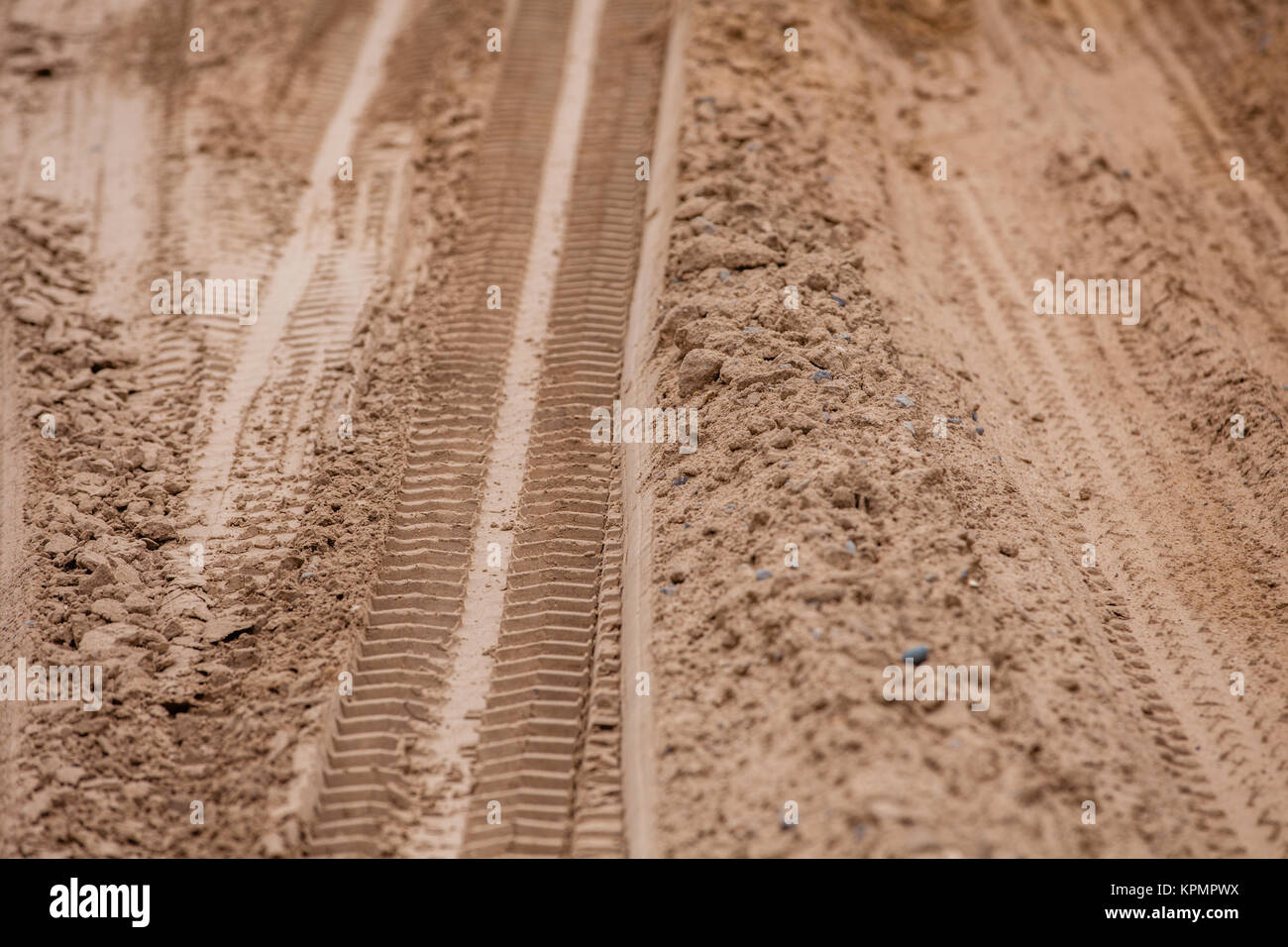 Tire tracks on the ground. Off road 4X4 wheel tracks on country desert ...