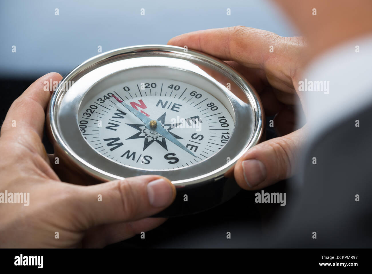 Close-up Of Person Hand With Compass Stock Photo - Alamy