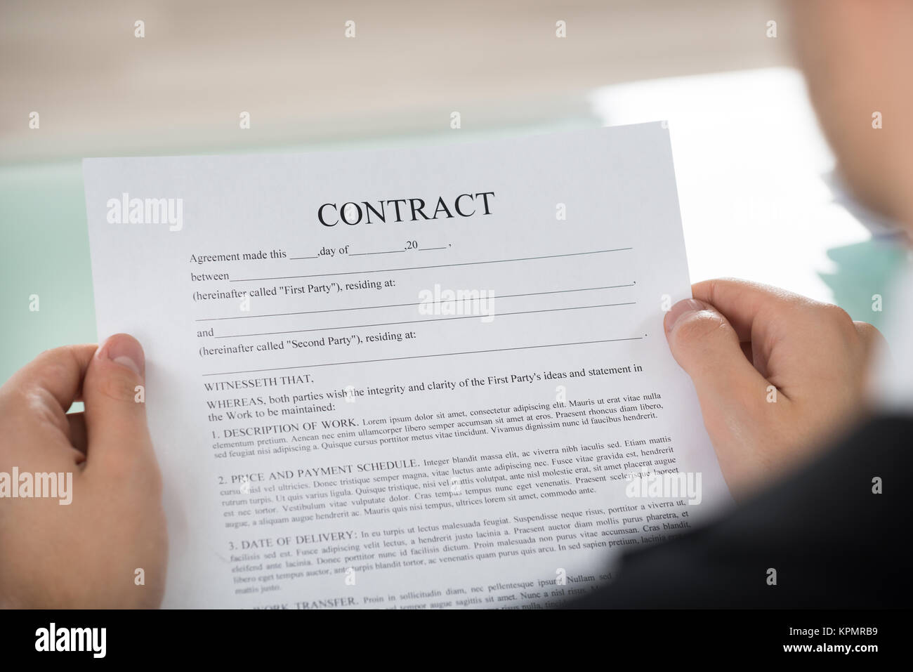 Businessman Holding Contract Form Stock Photo - Alamy