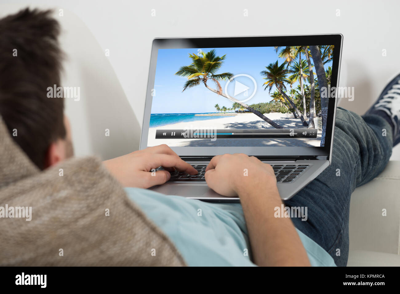 Man Watching Video On Laptop At Home Stock Photo - Alamy