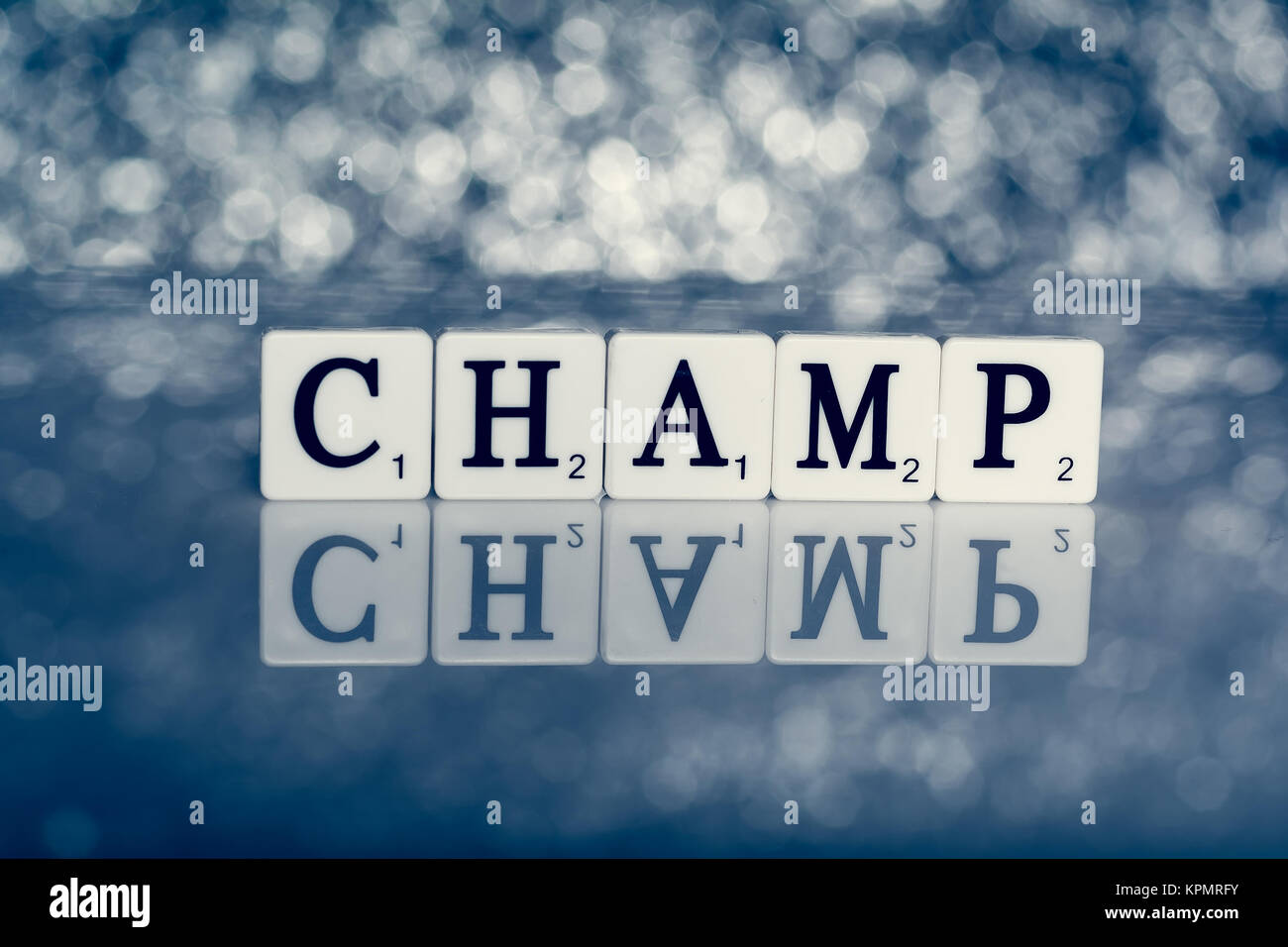 Written word of tiles with letters - champ Stock Photo - Alamy