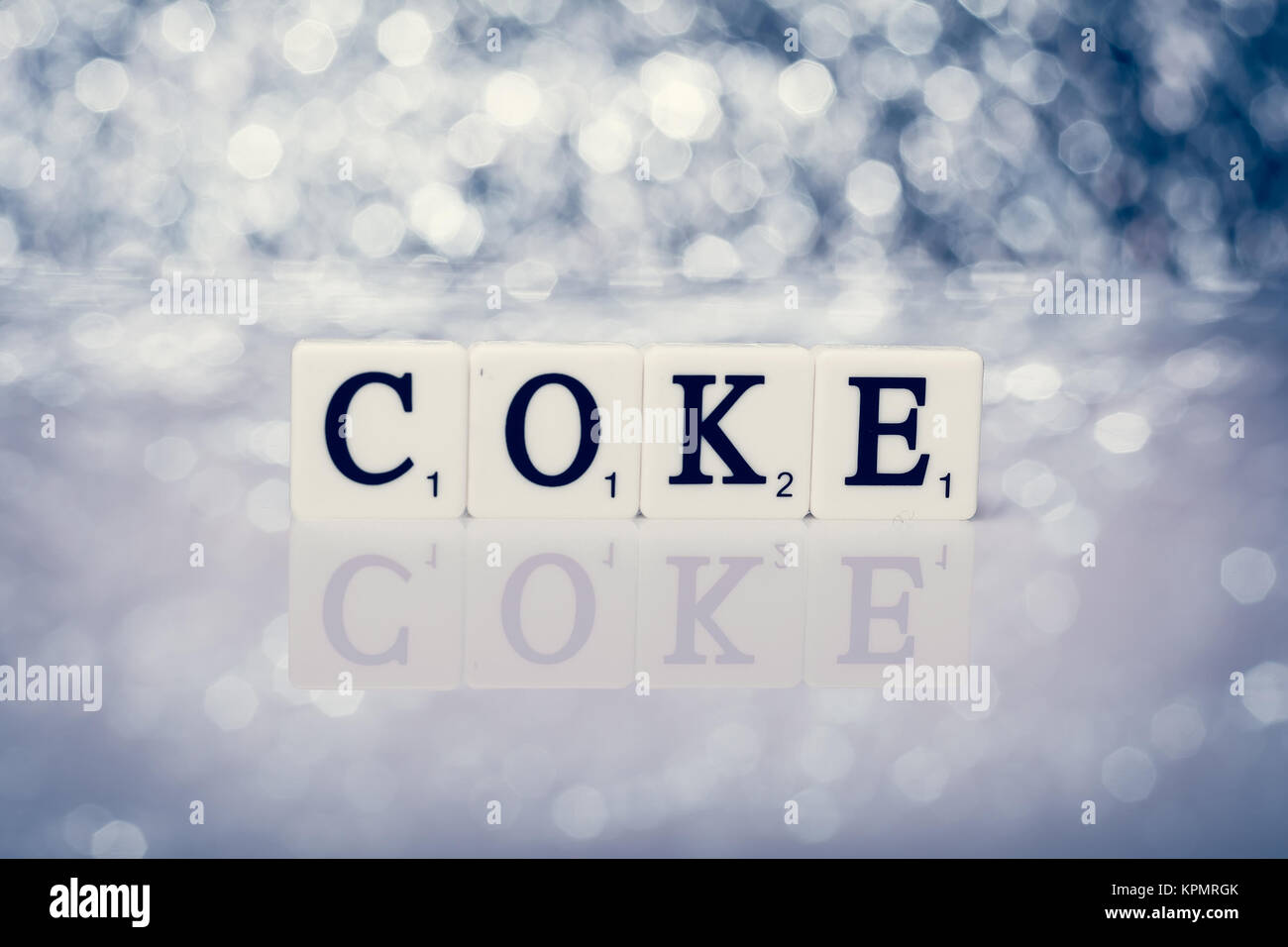 Written word of tiles with letters - coke Stock Photo - Alamy