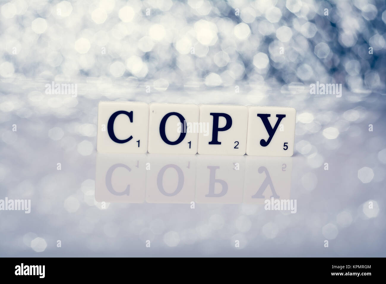 Written word of tiles with letters - copy Stock Photo - Alamy