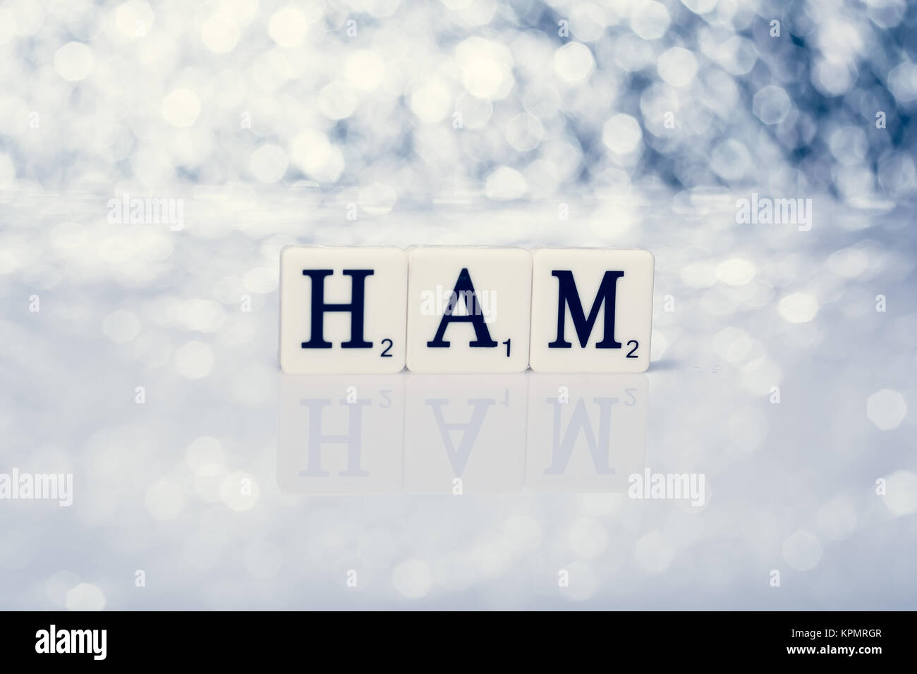 Written word of tiles with letters - ham Stock Photo - Alamy