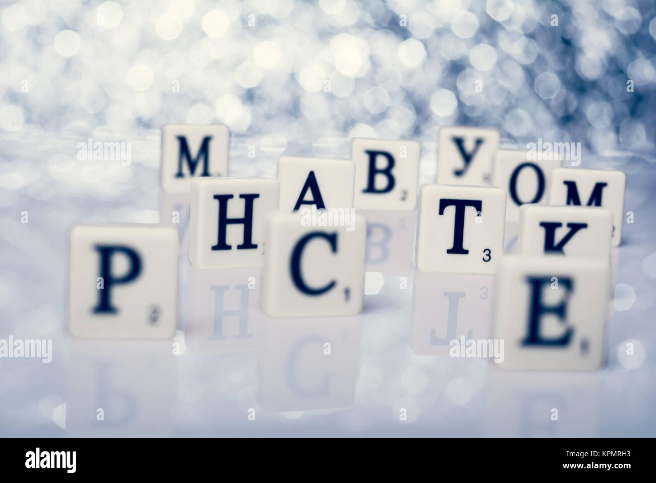 Written word of tiles with white letters Stock Photo - Alamy
