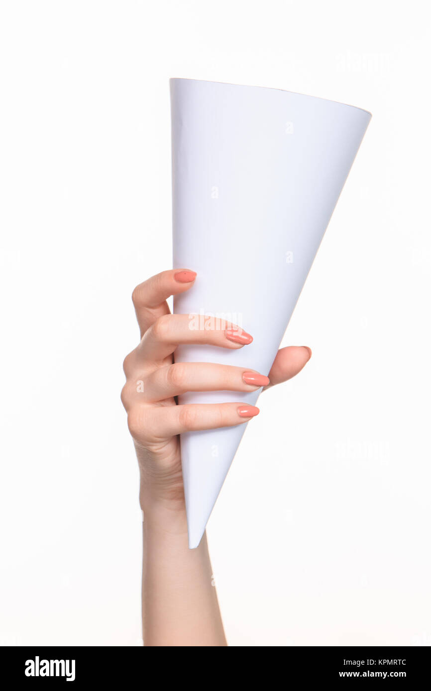 The cone in female hands on white background Stock Photo - Alamy