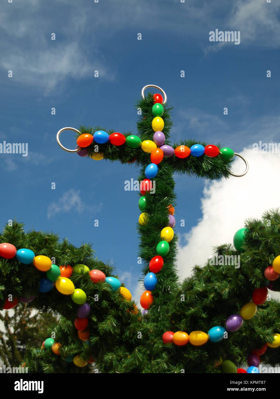 cross at an easter fountain Stock Photo - Alamy