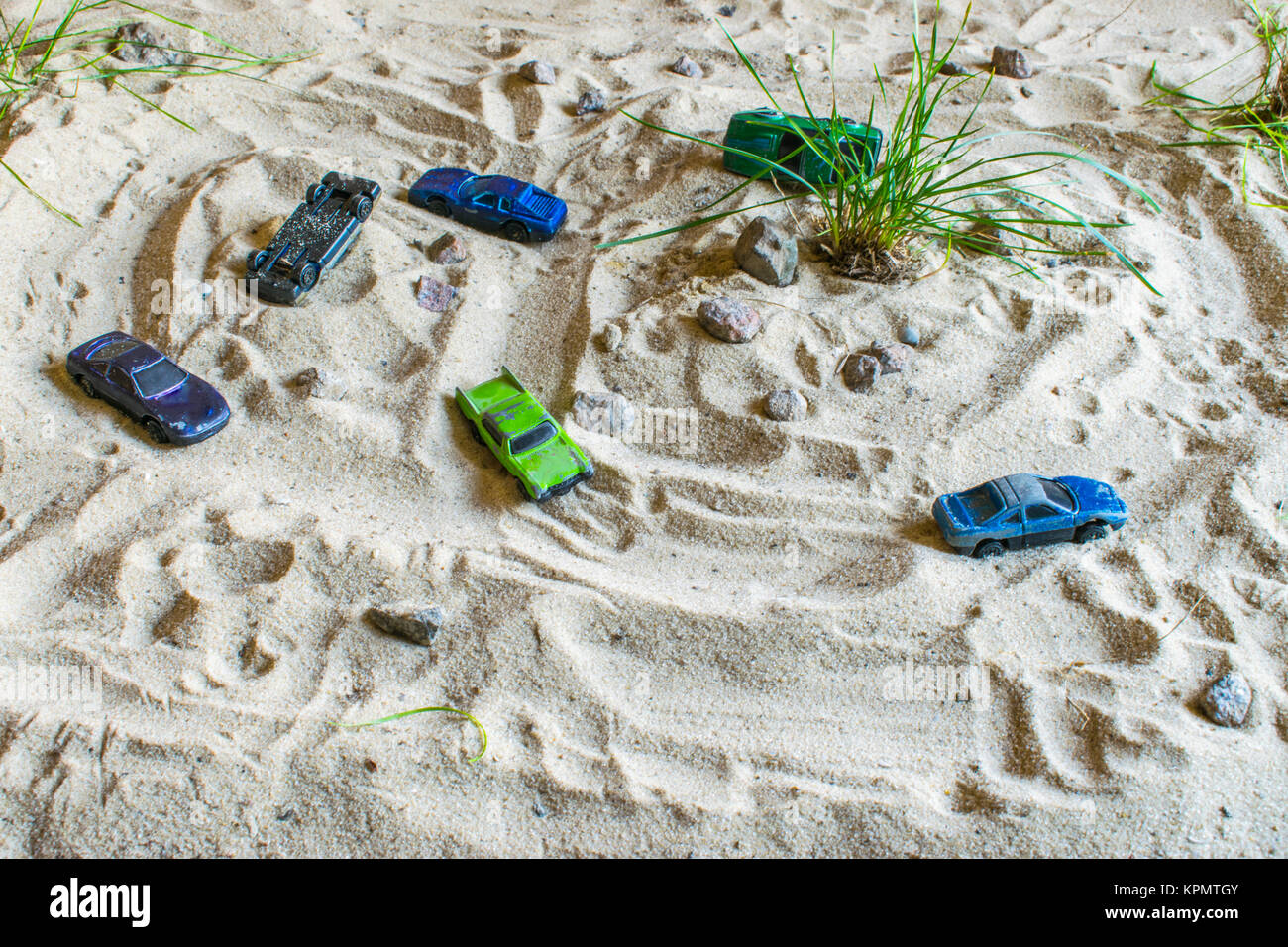 Racing cars on the sand compete who is faster. A very difficult track ...