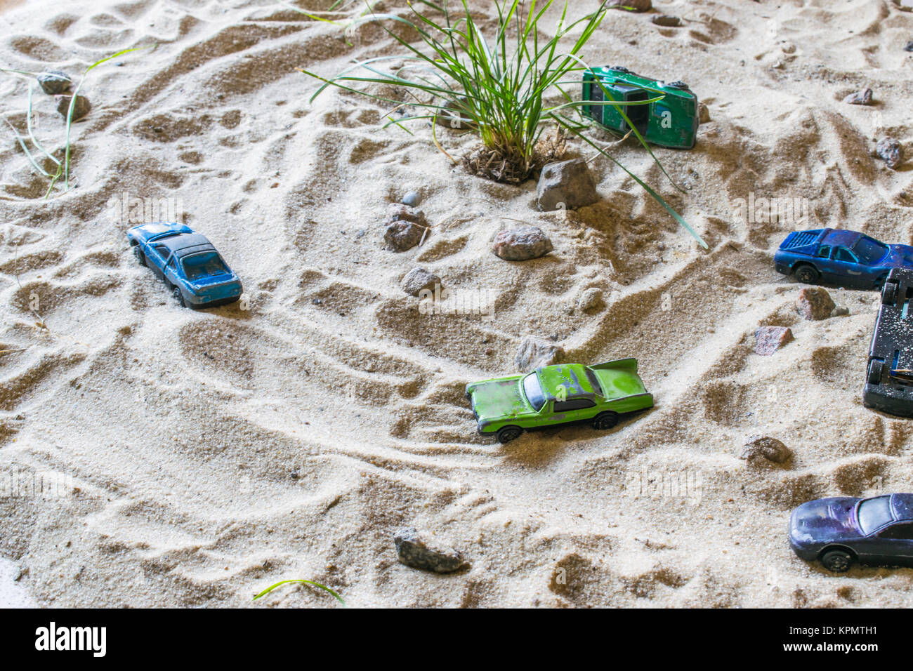 Racing cars on the sand compete who is faster. . One car turned over ...