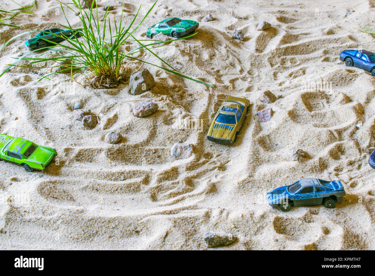 Racing cars on the sand compete who is faster. A very difficult track ...