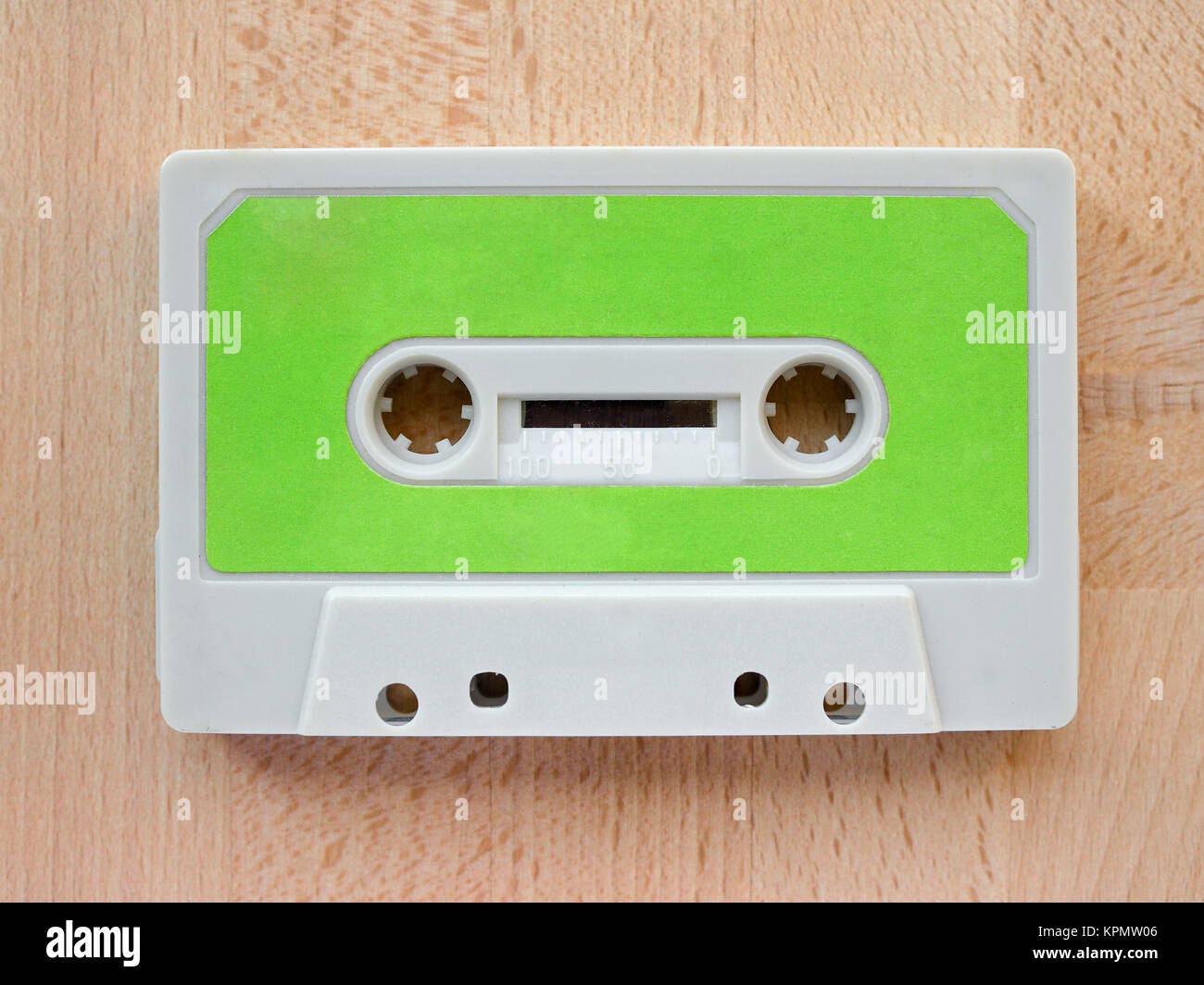 Magnetic tape cassette for analog audio music recording on a wooden ...