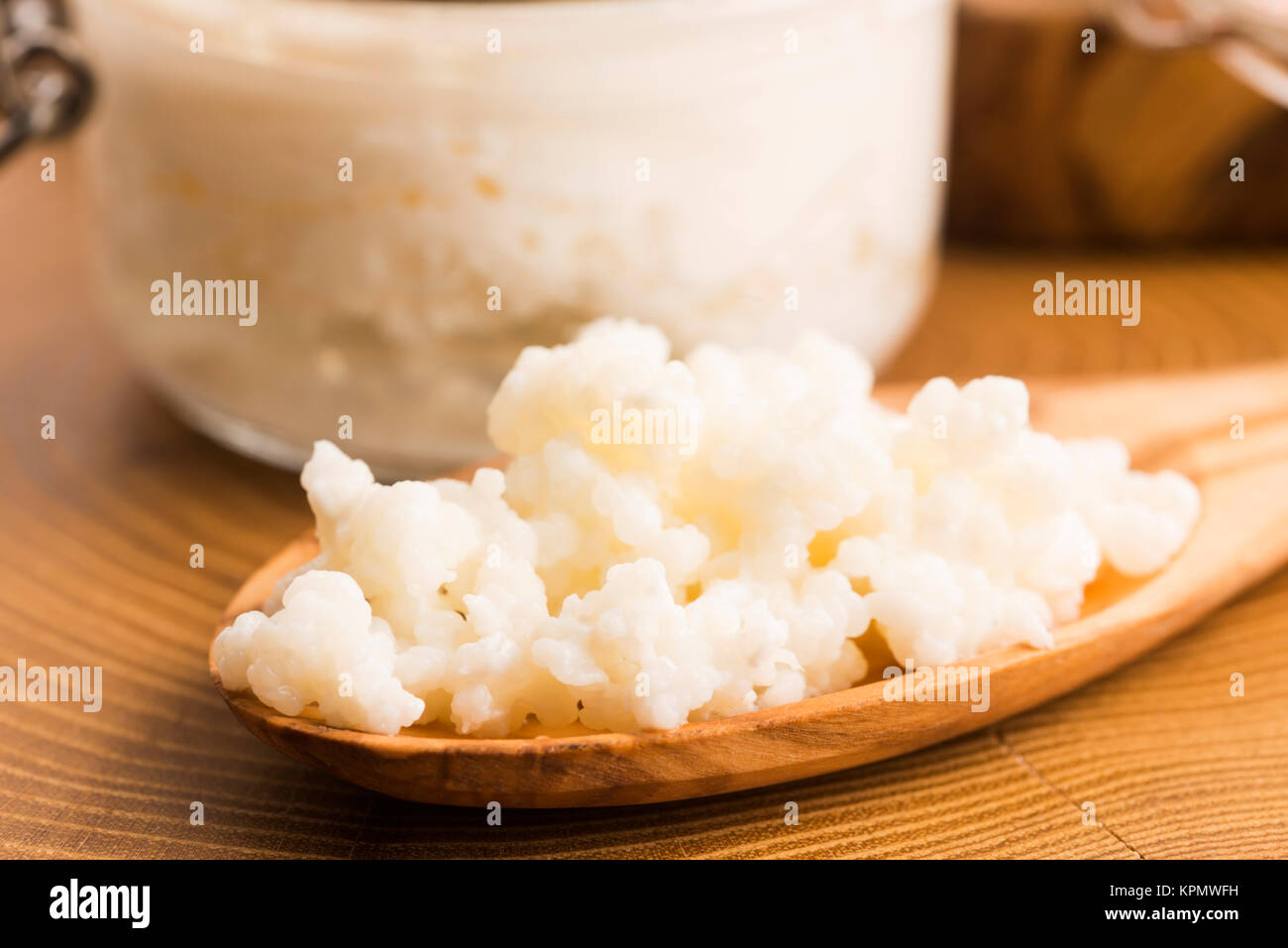 Organic probiotic milk kefir grains Stock Photo - Alamy