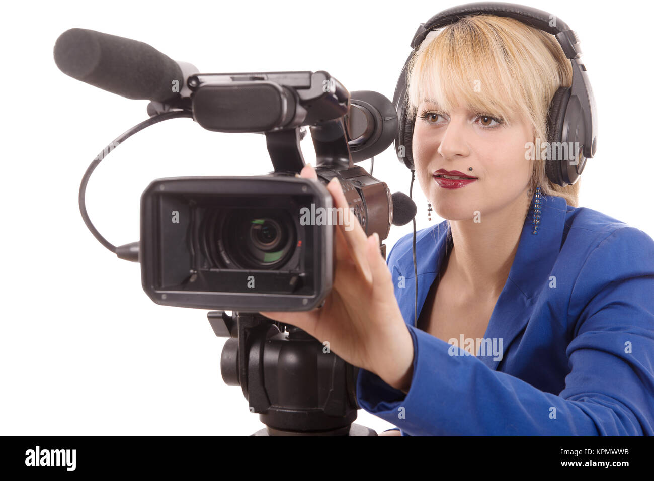 beautiful young woman with a professional video camera and headphone ...