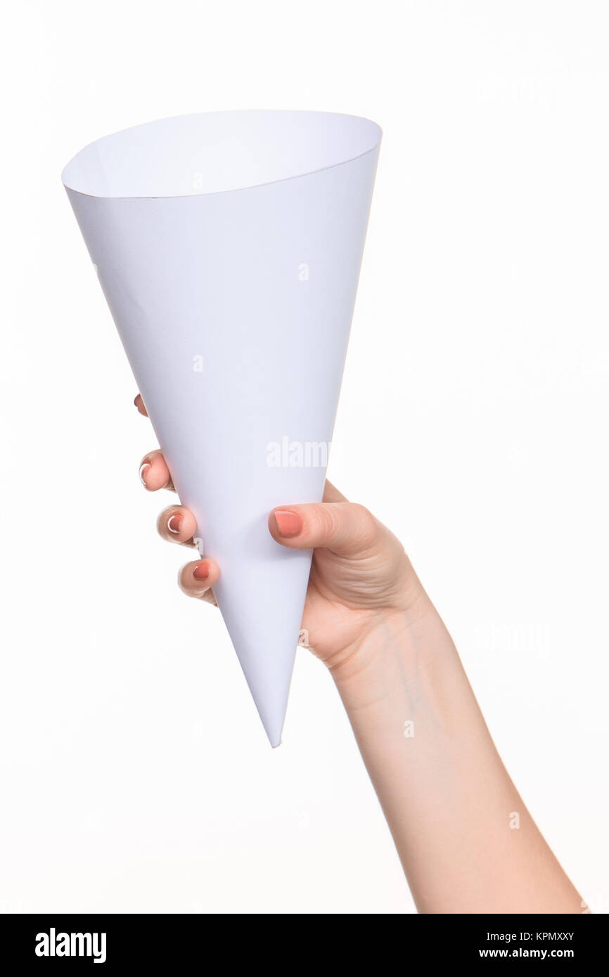 The cone in female hands on white background Stock Photo - Alamy