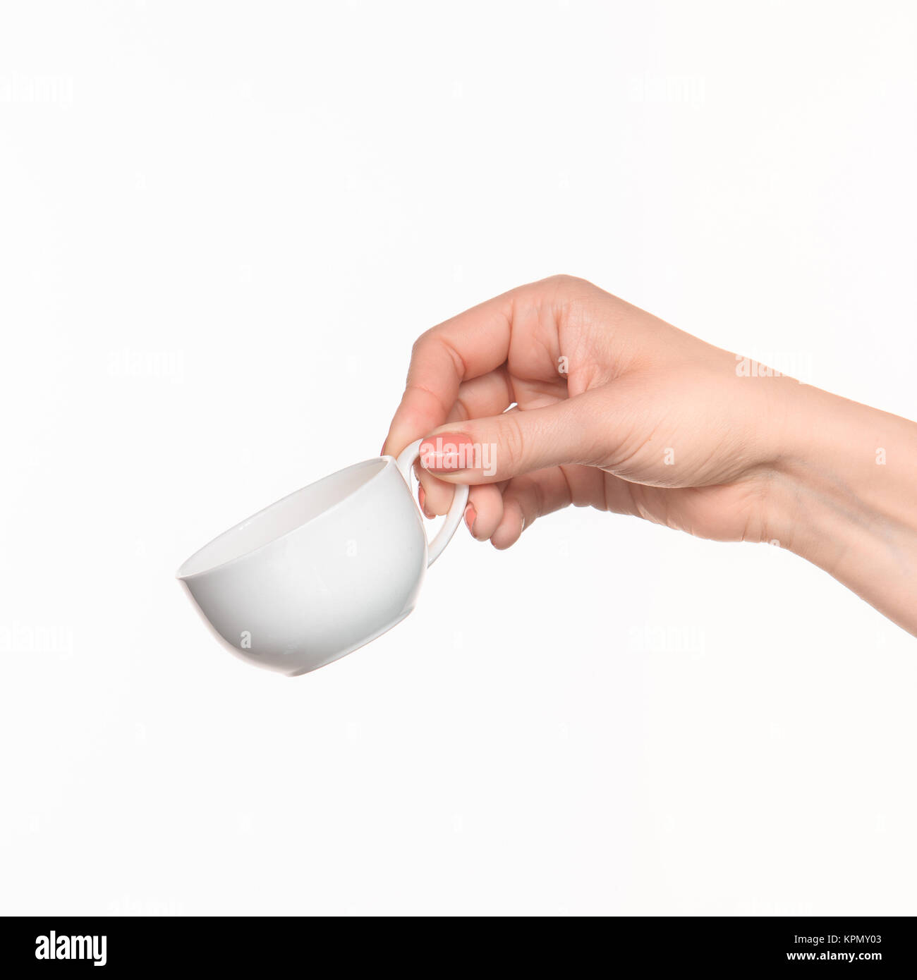 Woman hand with cup on white background Stock Photo - Alamy