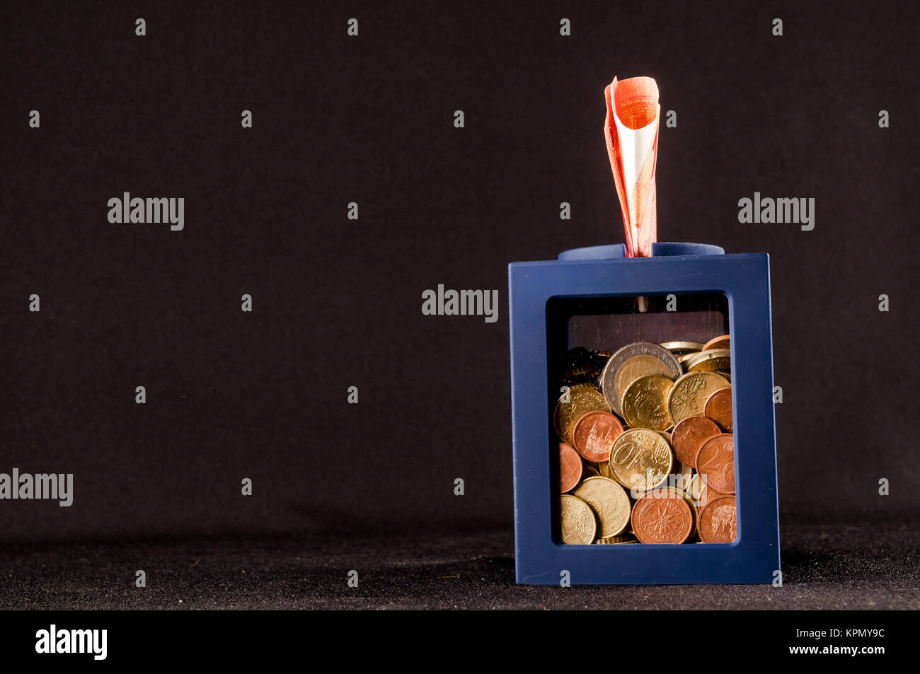 Picture of a Business Money Concept Idea Coin Container Stock Photo - Alamy