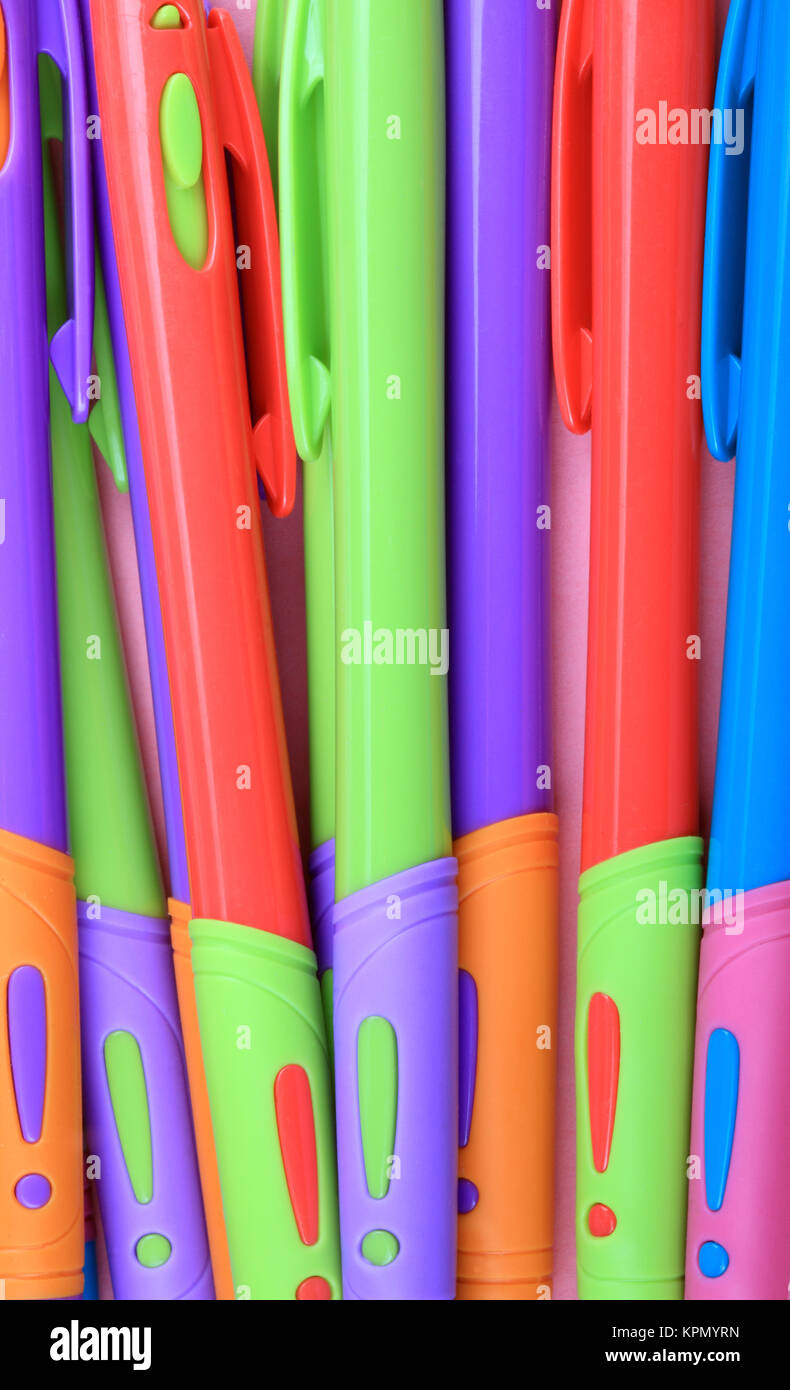 many Ball Pen on Pink Background Stock Photo - Alamy