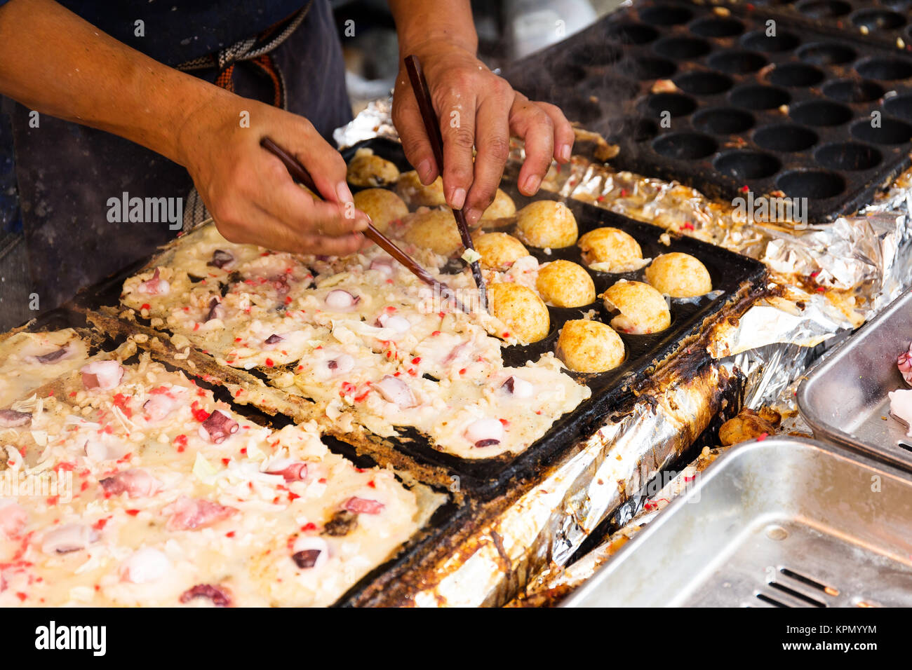 Cooking of tako yaki Stock Photo - Alamy