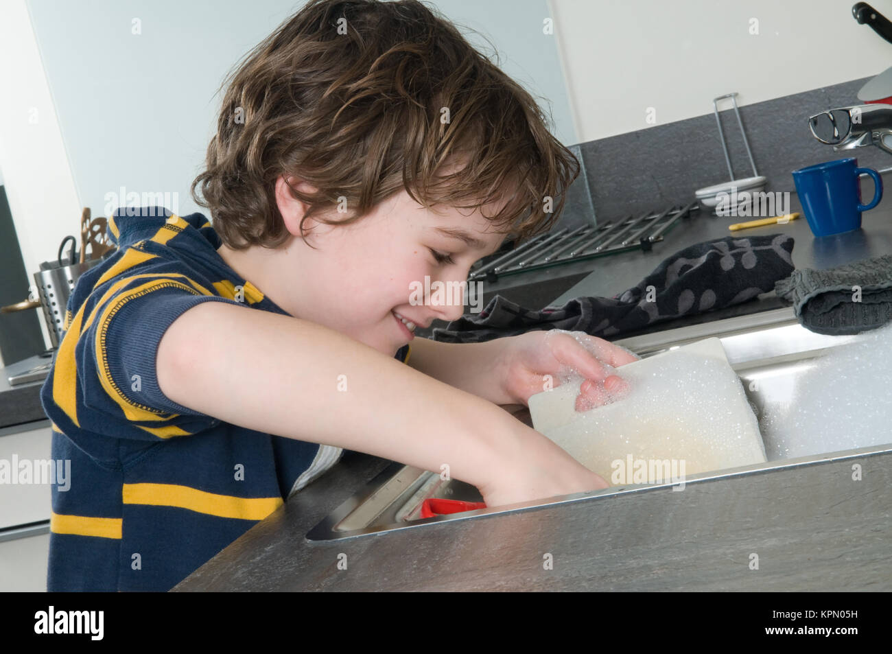 Doing the dishes Stock Photo - Alamy