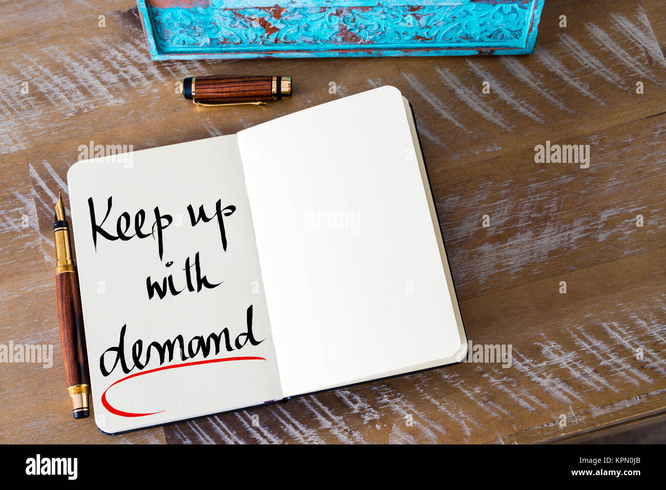 Written text Keep Up With Demand Stock Photo - Alamy