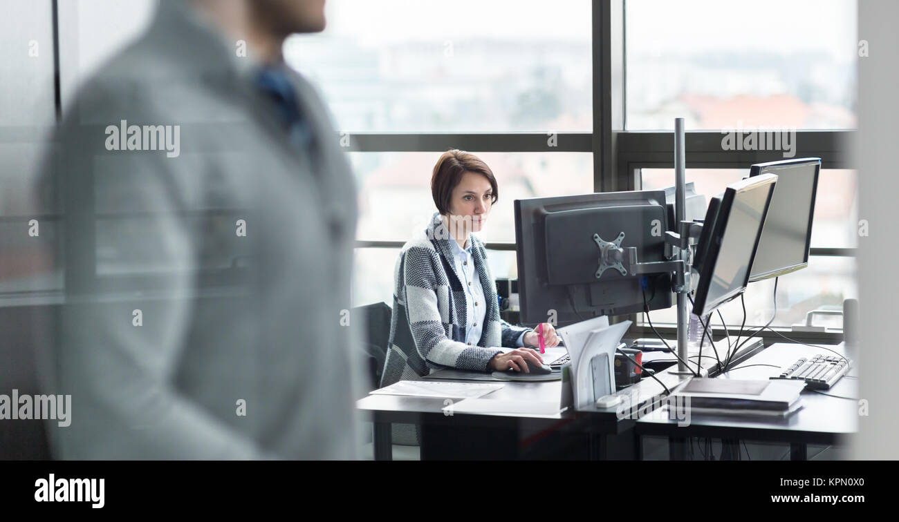 Personal assistant working in corporate office Stock Photo - Alamy