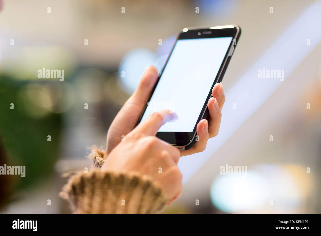 Woman touch on screen of cellphone Stock Photo - Alamy