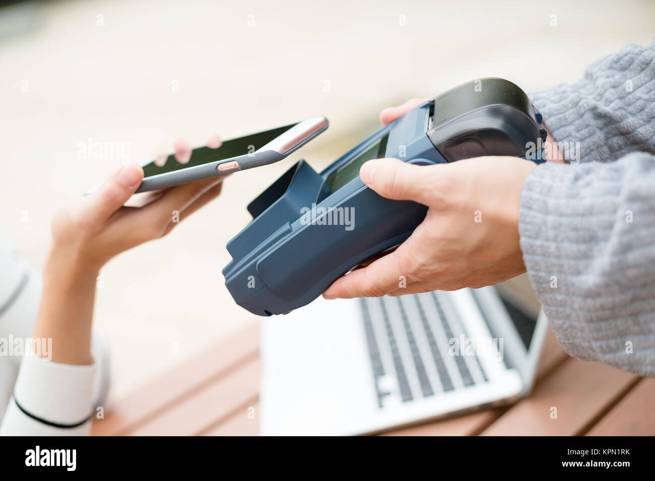 Customer pay with cellphone by NFC technology Stock Photo - Alamy