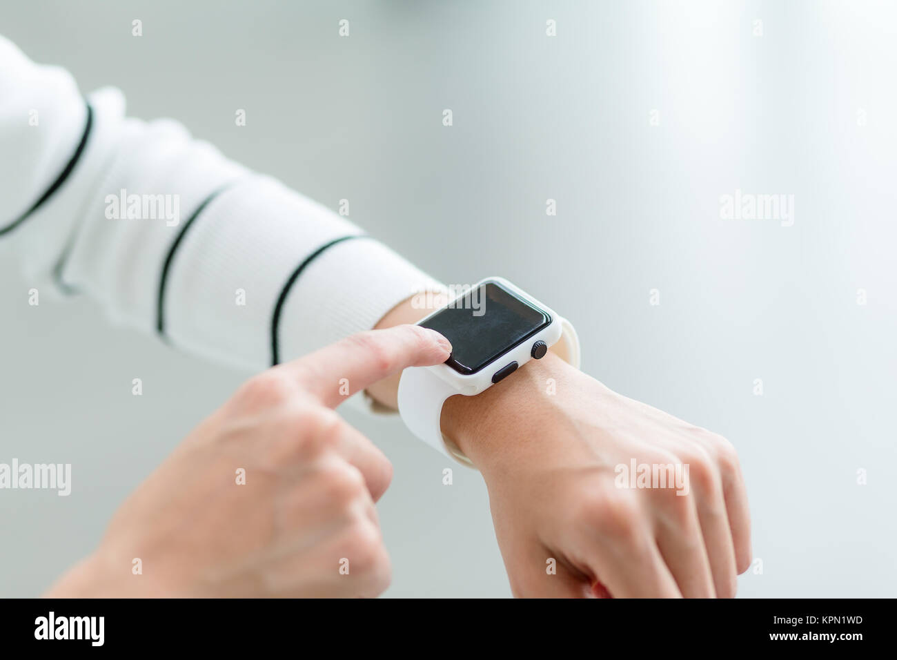 Woman use of smartwatch Stock Photo - Alamy