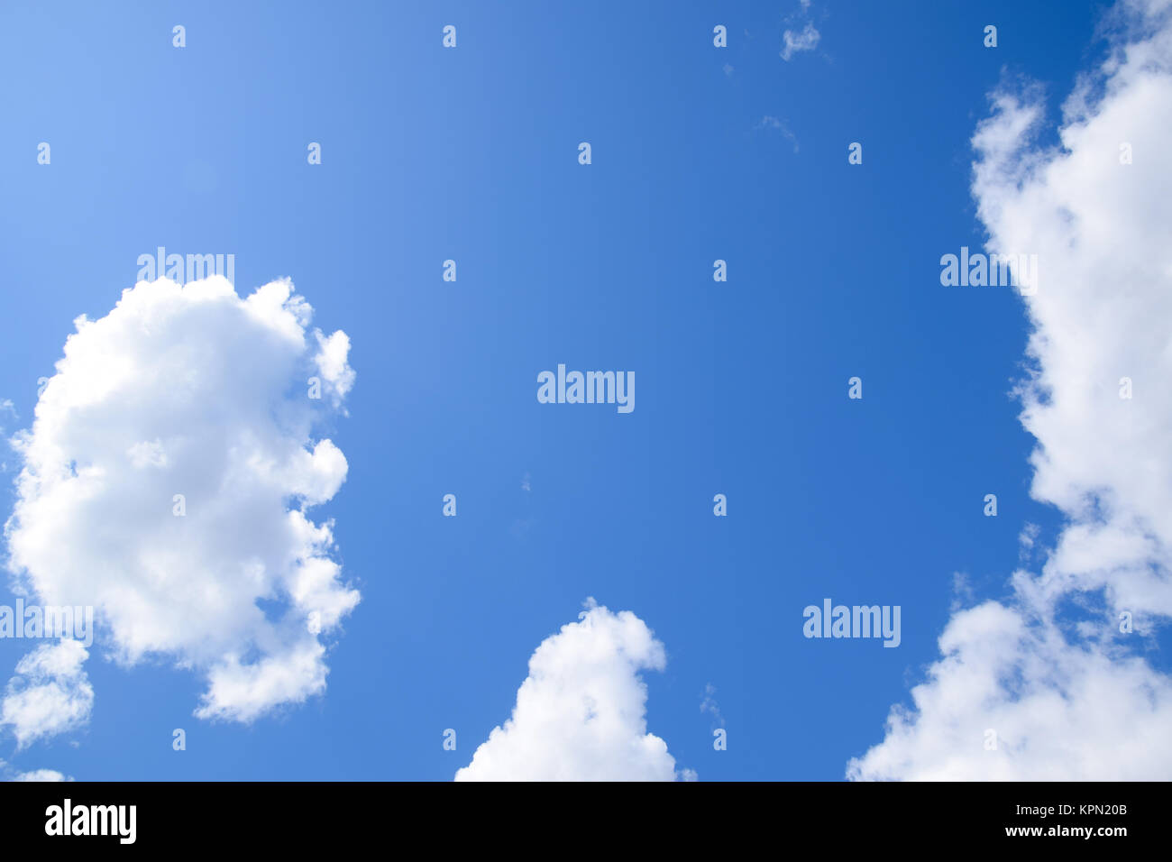 Bright midday blue sky with clouds Stock Photo - Alamy