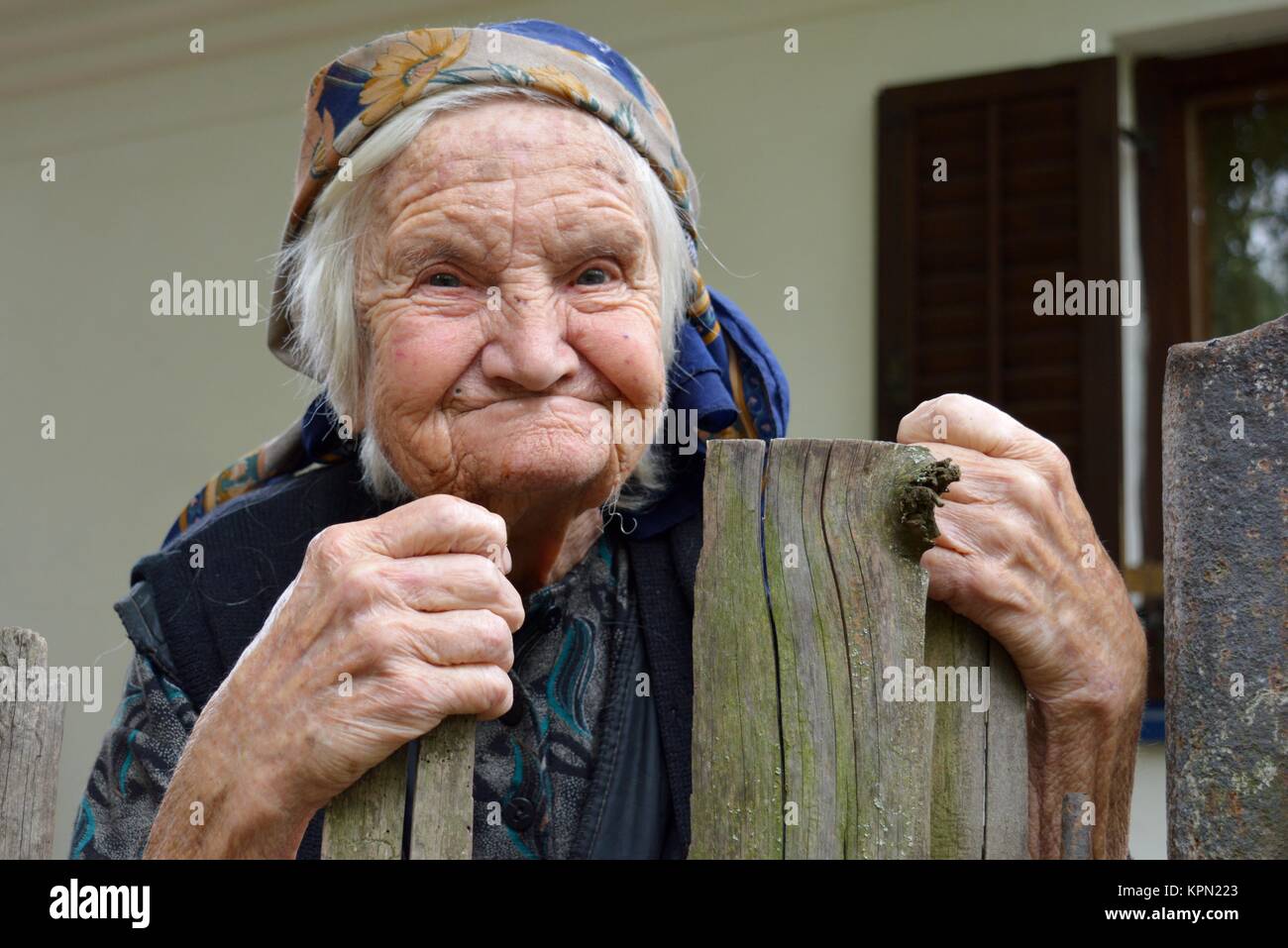 Grandma at the gate Stock Photo - Alamy