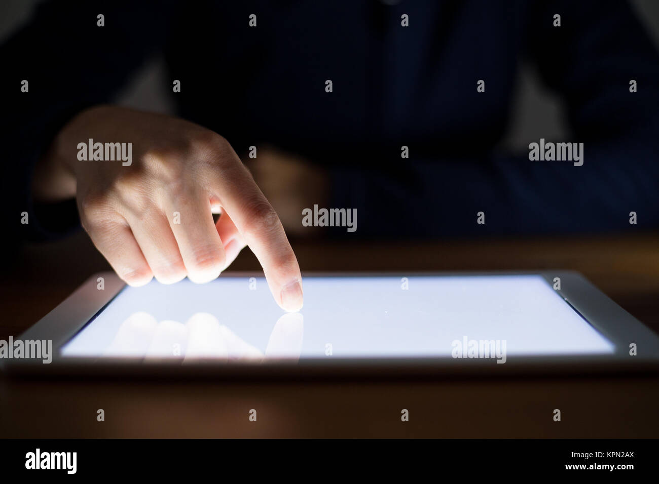 Woman finger touch on the screen of digital tablet Stock Photo - Alamy
