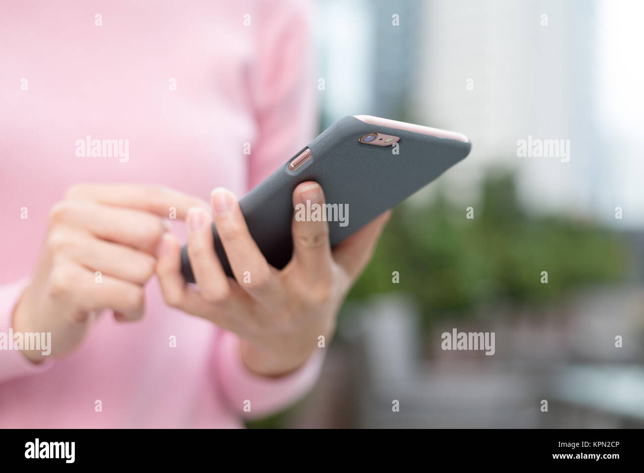 Woman using cellphone at outdoor Stock Photo - Alamy