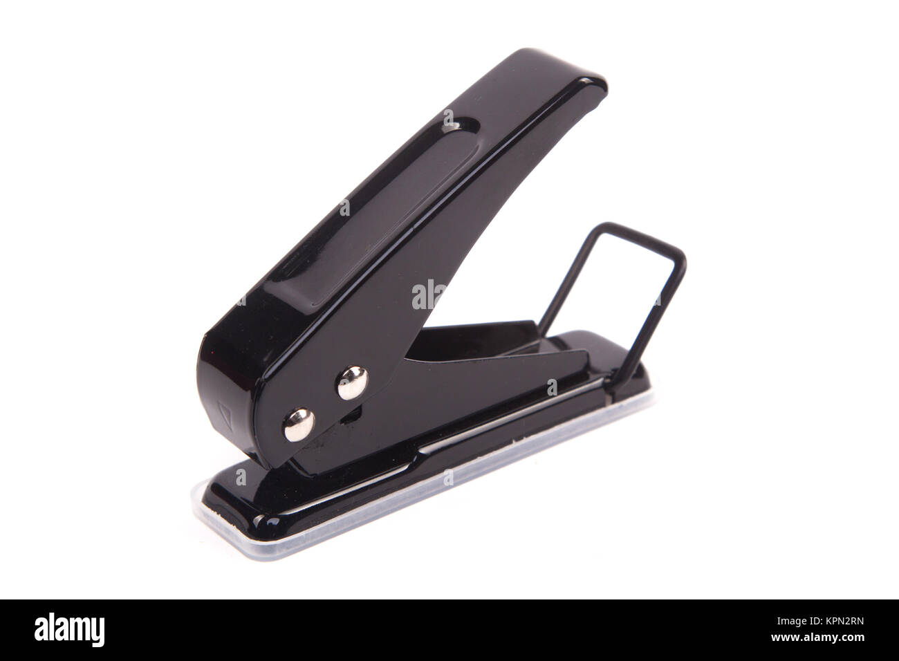 punch paper on a white background Stock Photo - Alamy