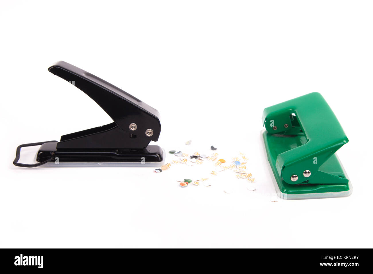 punch paper on a white background Stock Photo - Alamy