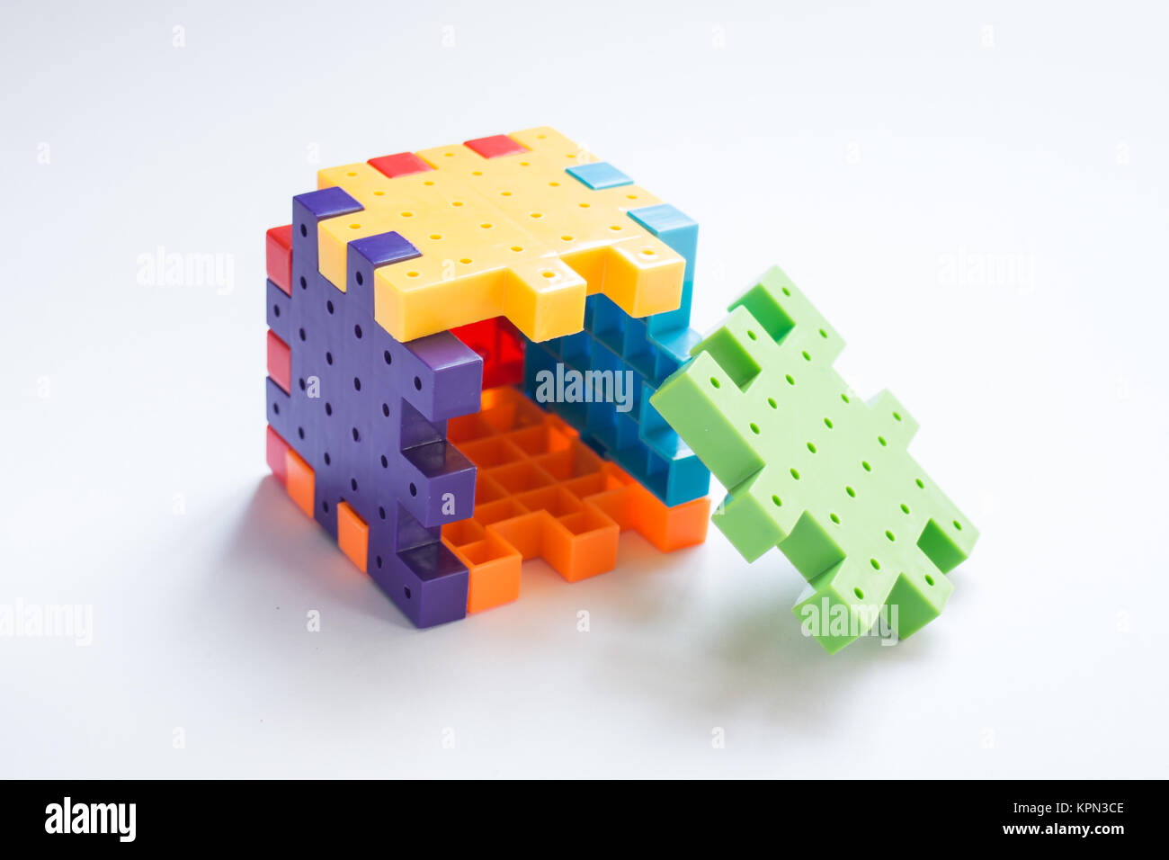 Colorful plastic jigsaw puzzle game Stock Photo - Alamy