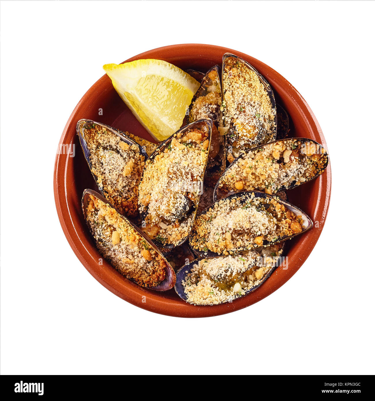 Isolated round bowl of savory breaded sea shells and lemon slice over ...