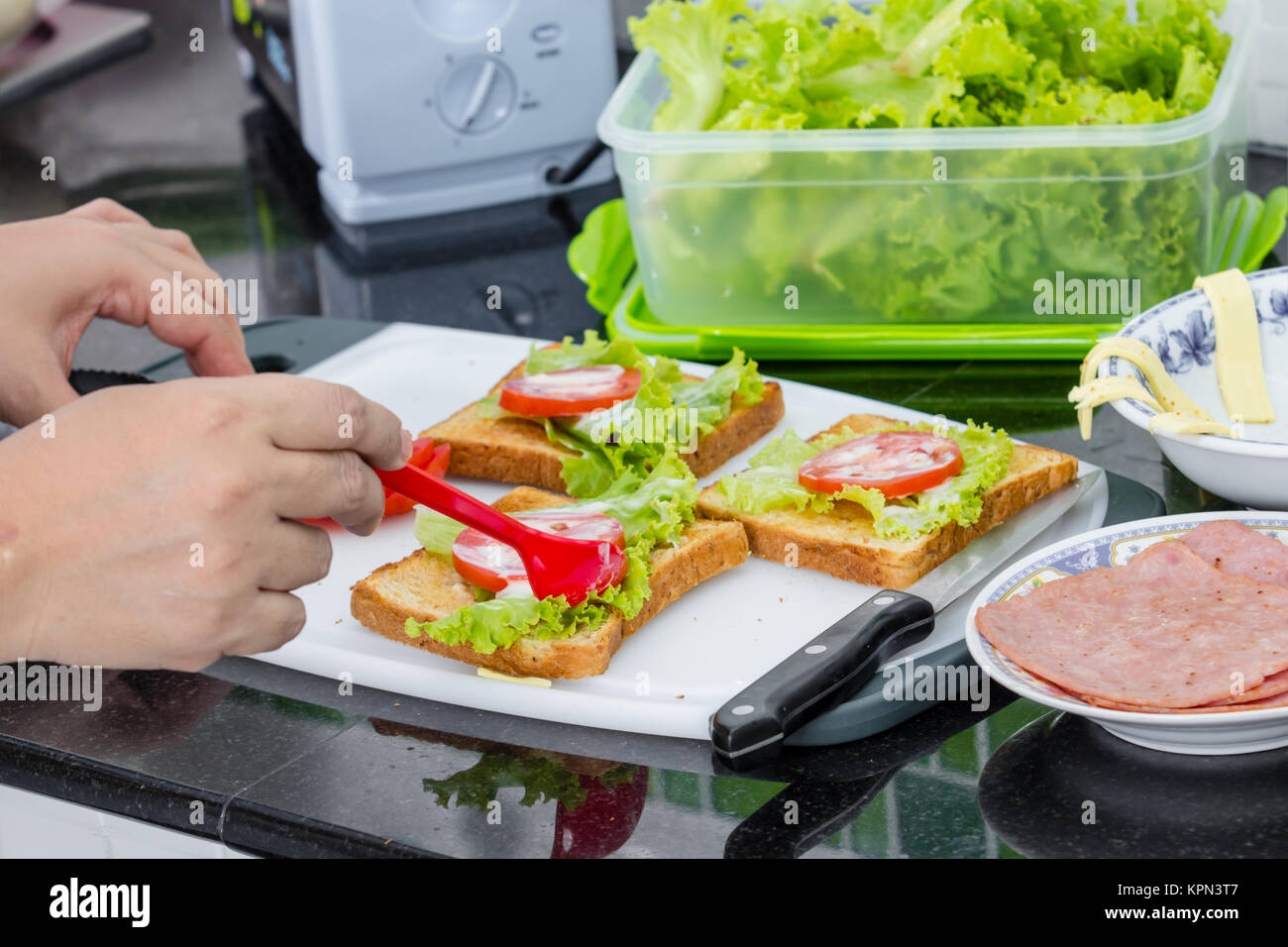 Making a sandwich Stock Photo - Alamy