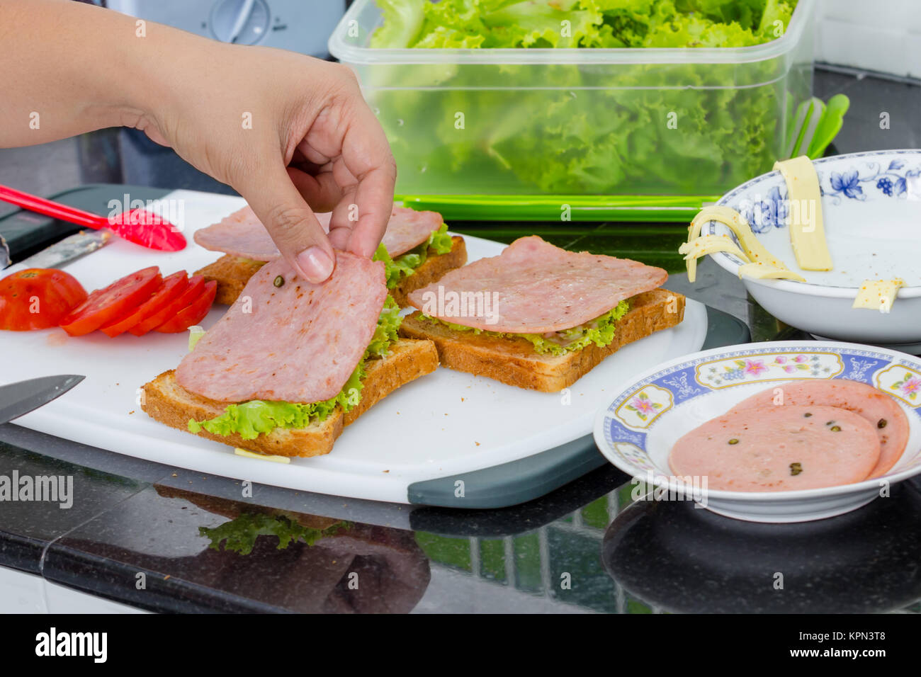 Making a sandwich Stock Photo - Alamy