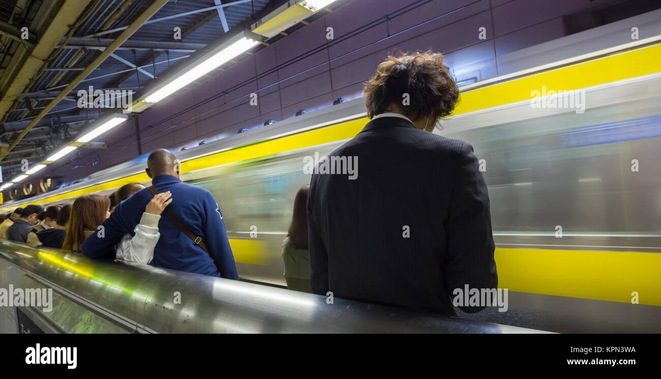Passengers traveling by Tokyo metro Stock Photo - Alamy