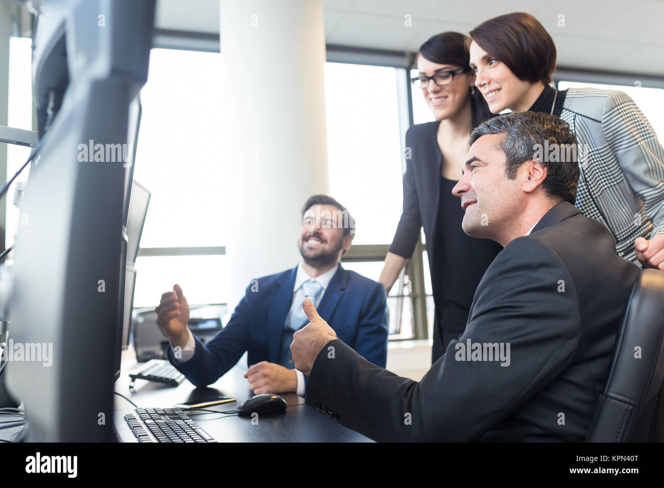 Business team working in corporate office Stock Photo - Alamy