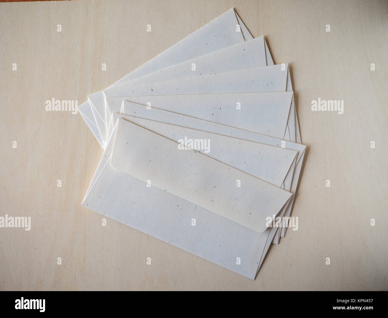 Letter envelope on wood table Stock Photo - Alamy