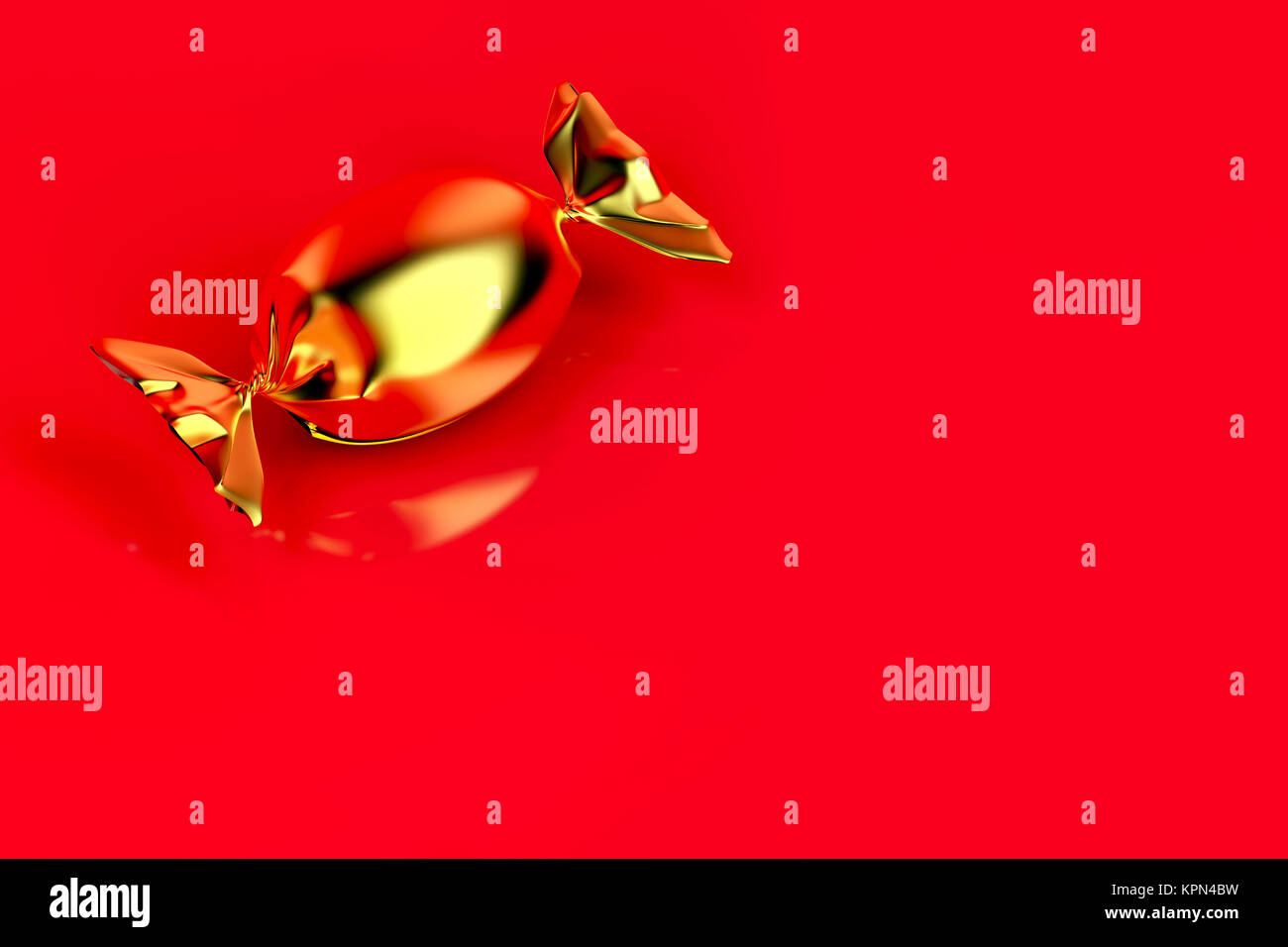 Gold wrapped candy Stock Photo - Alamy