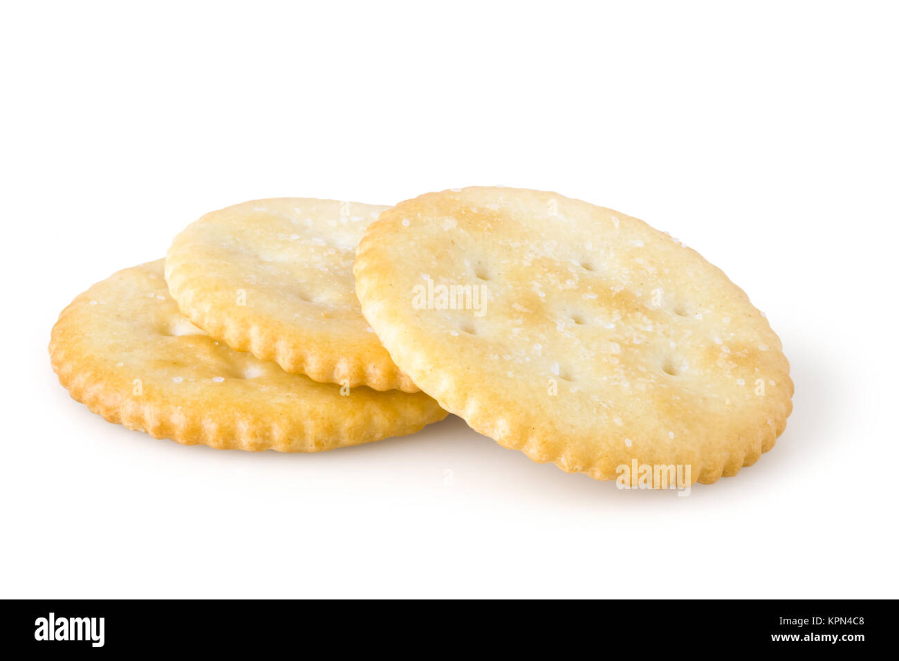 Golden round crackers over white background Stock Photo - Alamy