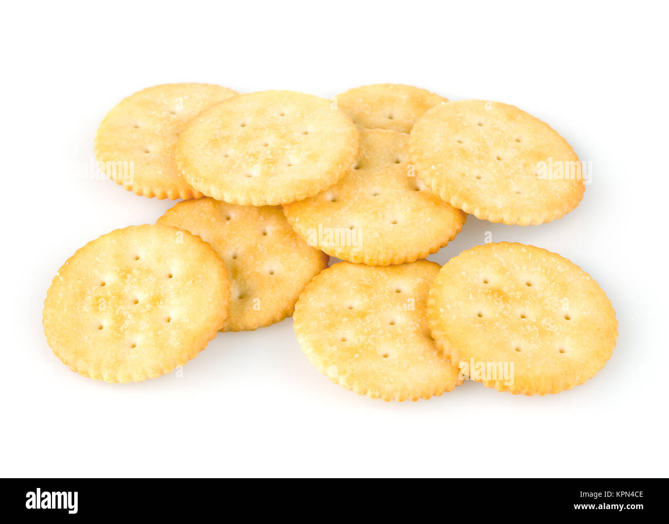 Golden round crackers over white background Stock Photo - Alamy