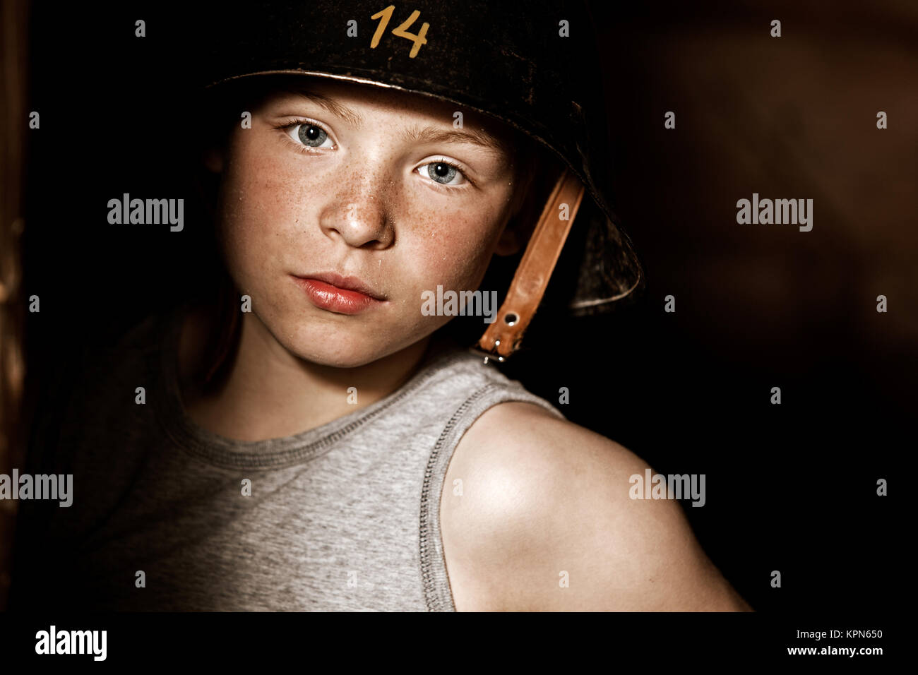 Boy and helmet army hi-res stock photography and images - Alamy