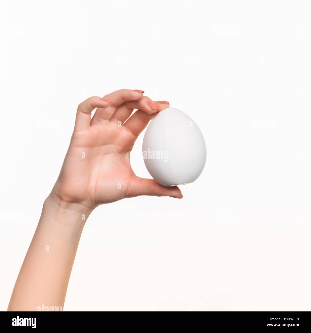 Female arm holding earth globe Cut Out Stock Images & Pictures - Alamy