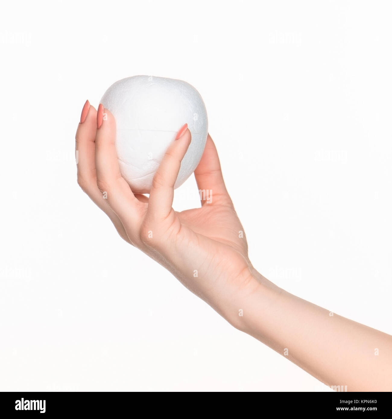 The female hand holding white blank styrofoam oval Stock Photo - Alamy